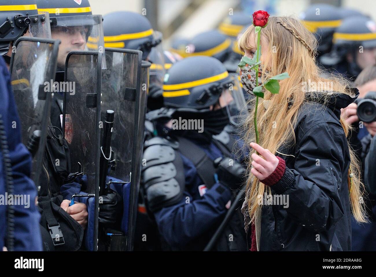Climate protestors clash with riot police during a rally against global ...