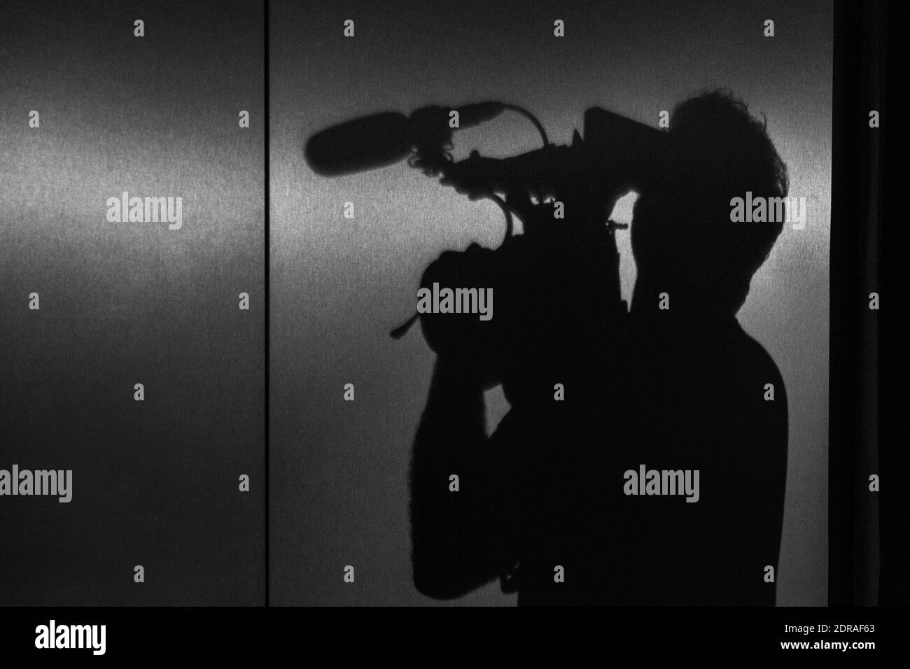 Man shadow wall silhouette Black and White Stock Photos & Images - Alamy