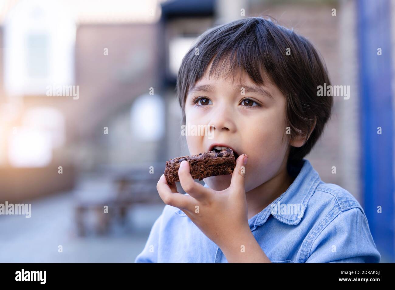 Indian eating desert cake hi-res stock photography and images - Alamy