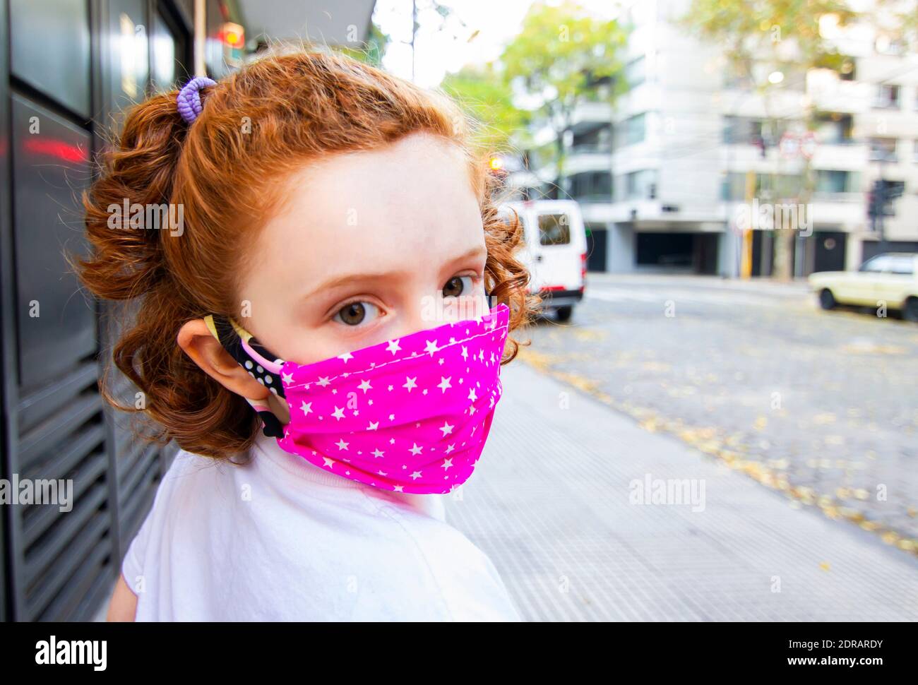 Portrait Of Cute Girl With Mask Stock Photo - Alamy