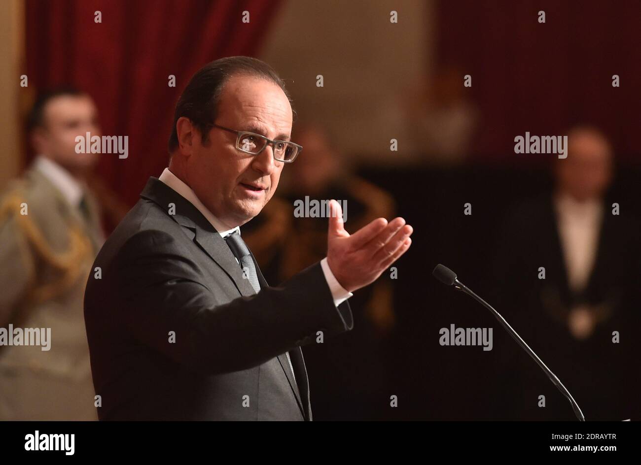 French President Francois Hollande delivers his speech during a ...