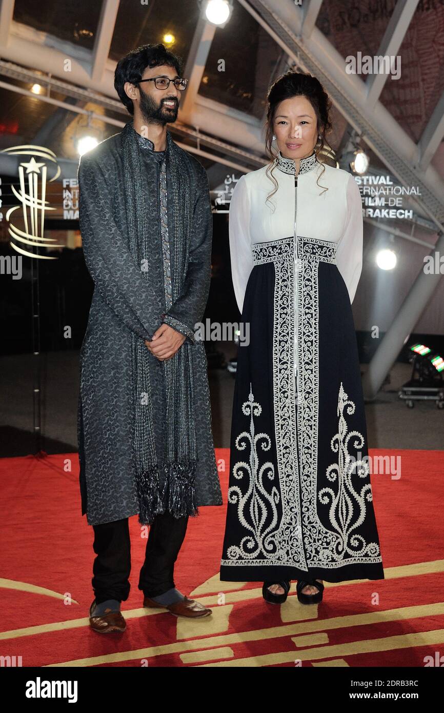 Raam Reddy and Sunmin Park walking the red carpet for the closing ...