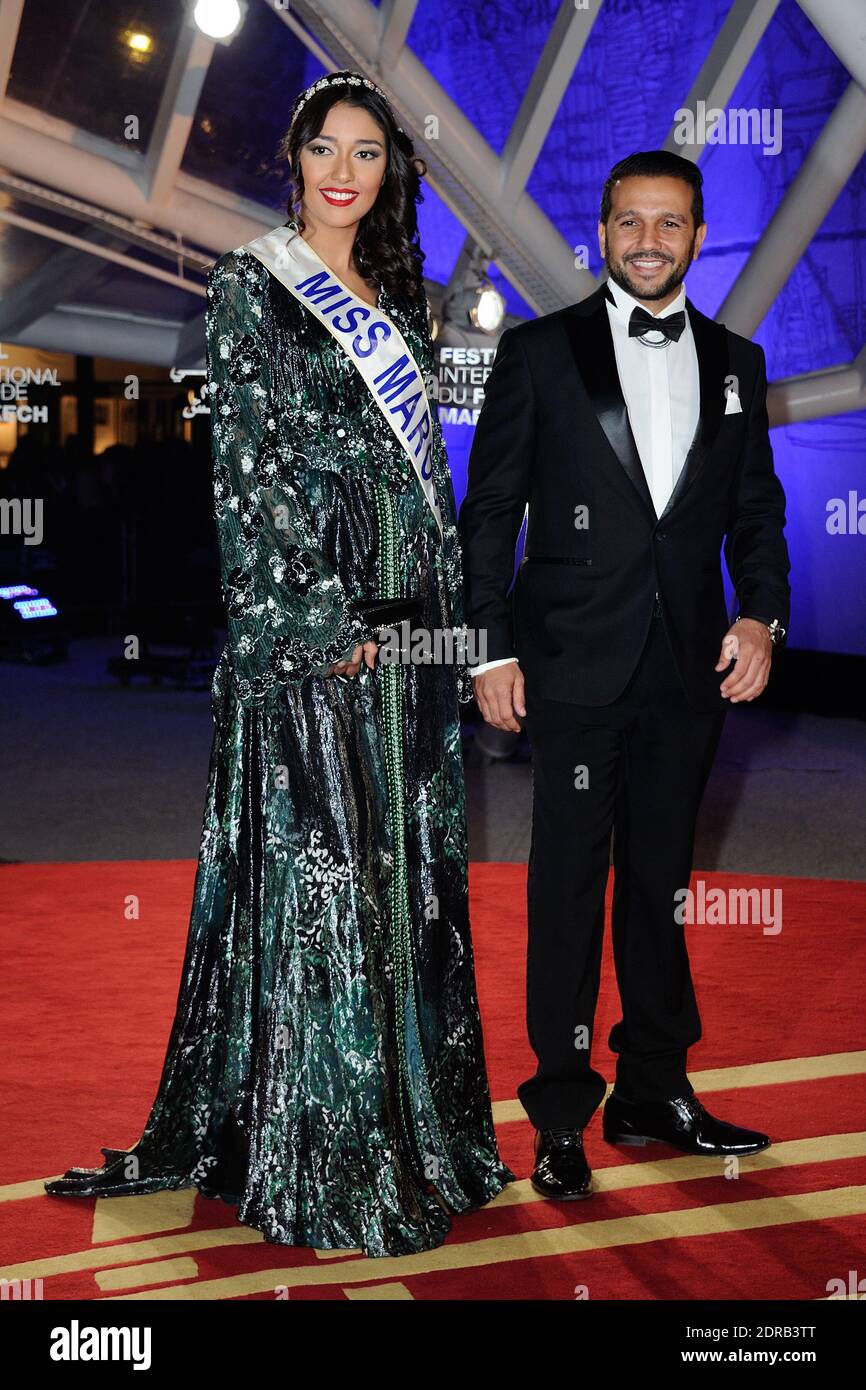 Fatima Zahra El Hor (Miss Morocco) and guest walking the red carpet for ...