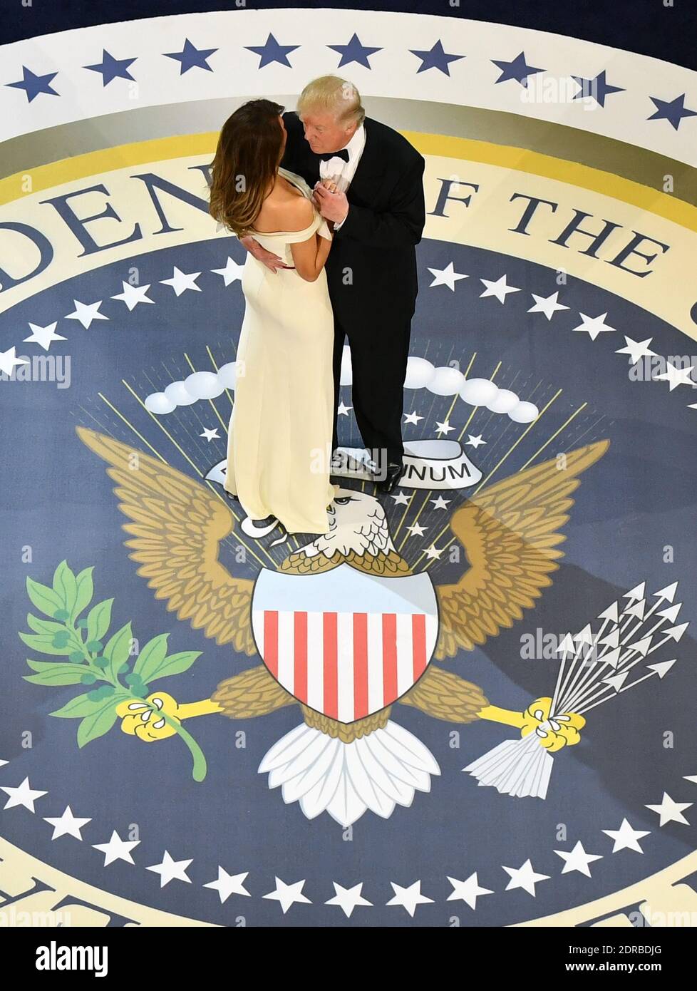 President Donald Trump dances with First Lady Melanie Trump while ...