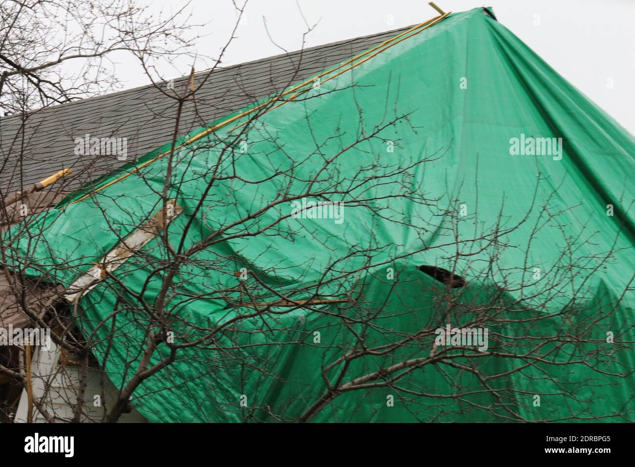 weather disaster causes damage to a roof Stock Photo - Alamy