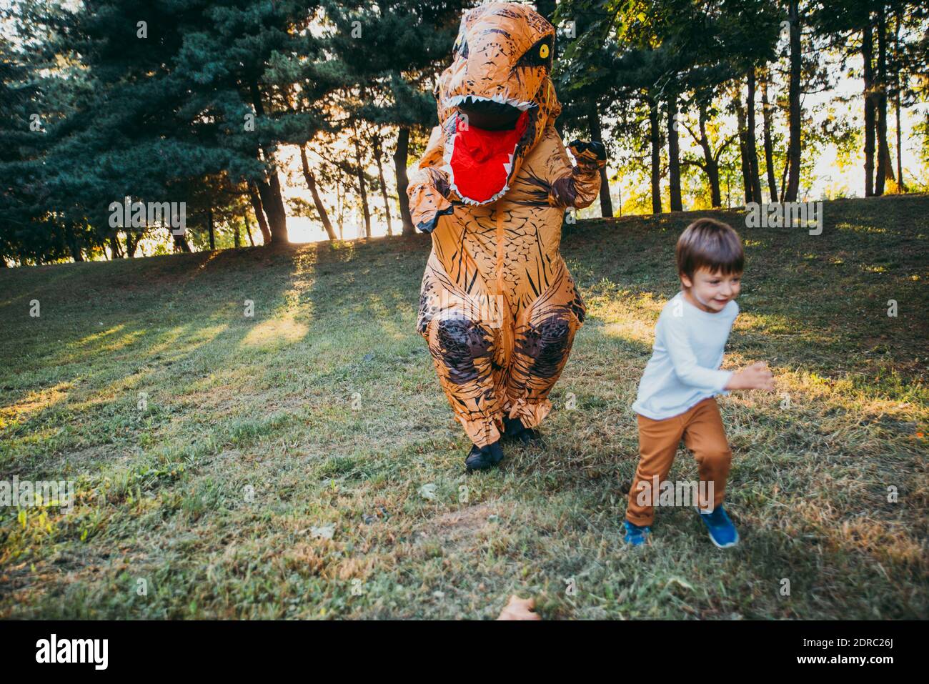 Dinosaur chasing hi-res stock photography and images - Alamy