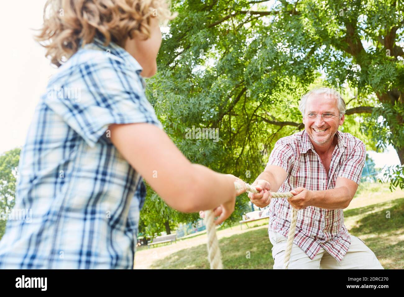 Boys Pulling Rope High Resolution Stock Photography and Images - Alamy