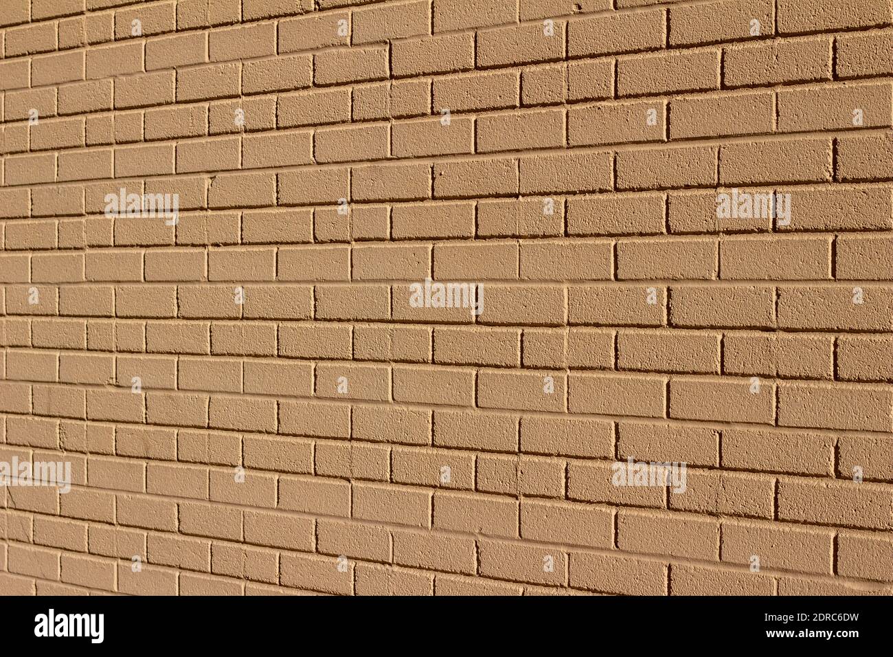 Full frame texture background of a textured beige painted exterior ...
