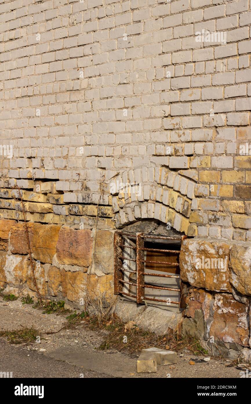 Full frame view of an eroding antique exterior brick wall surface with ...