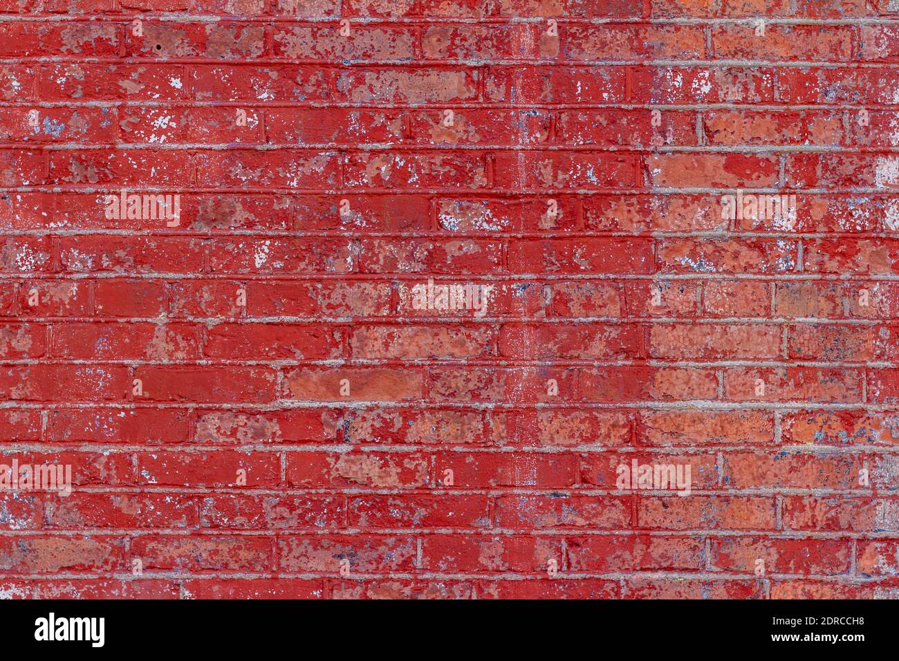 Full frame shabby chic view of an eroding antique exterior brick wall ...