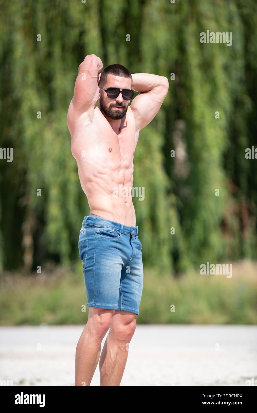 Handsome Beard Man Standing Strong and Posing at Outdoors - Background ...