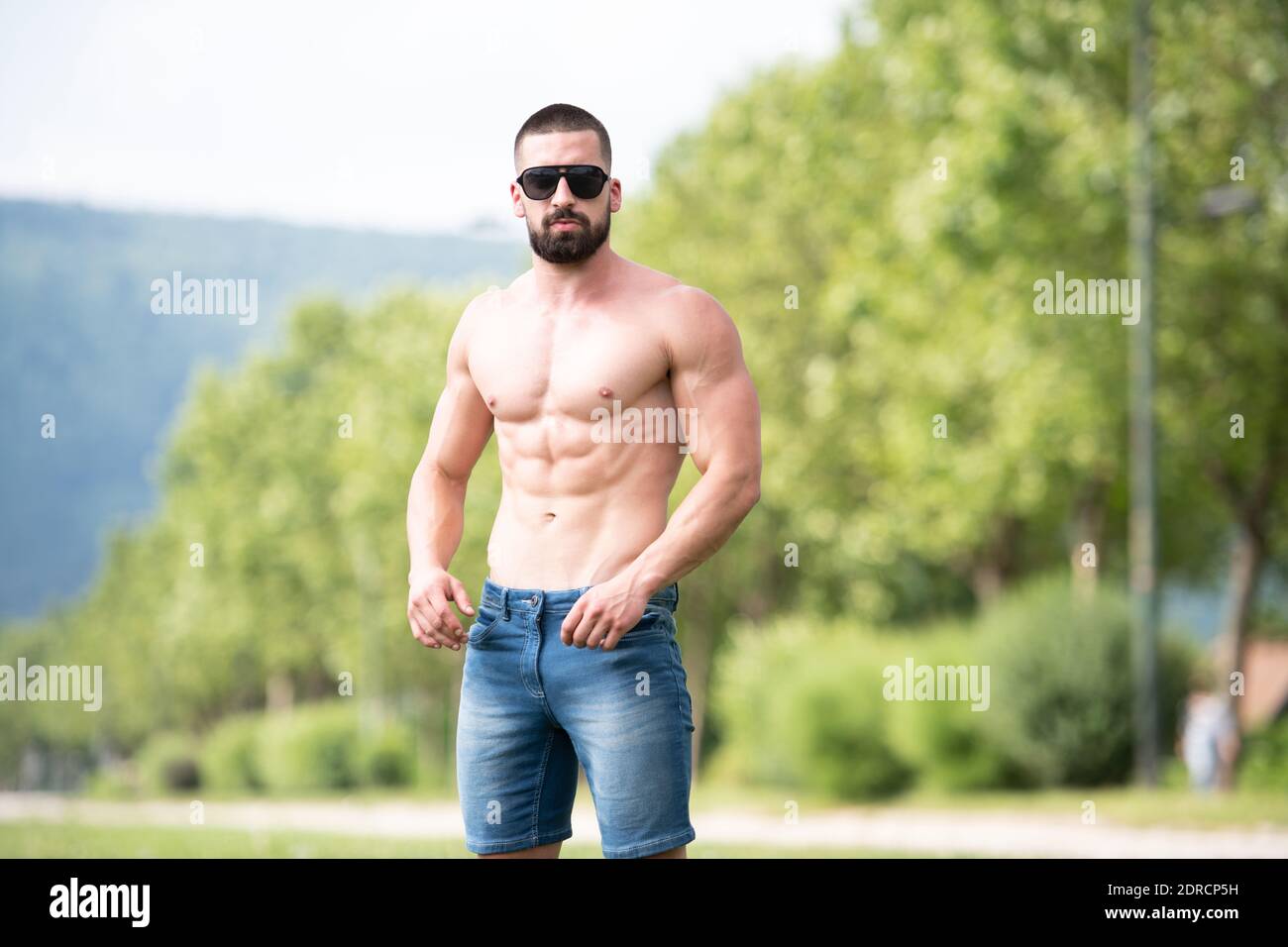 Handsome Beard Man Standing Strong and Posing at Outdoors - Background ...