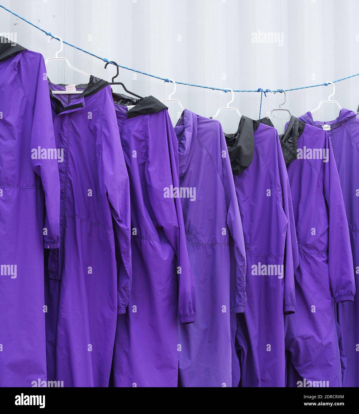 Uniforms hanging hi-res stock photography and images - Alamy