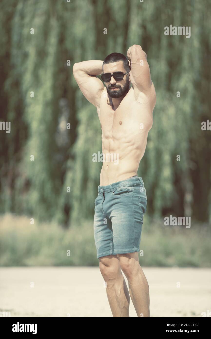Handsome Beard Man Standing Strong and Posing at Outdoors - Background ...