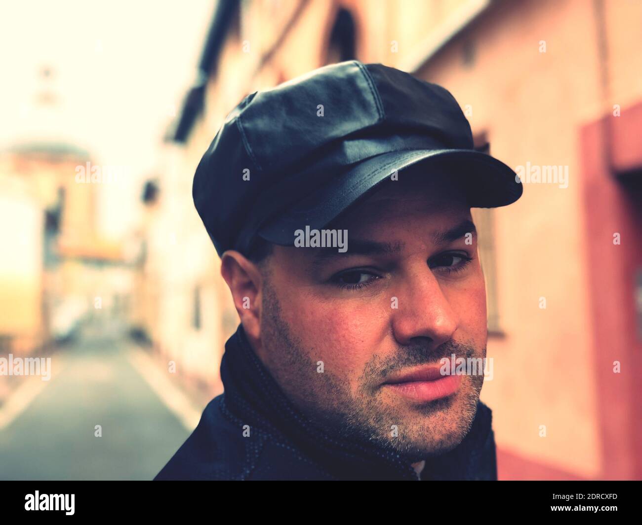 Man with black cap hi-res stock photography and images - Alamy