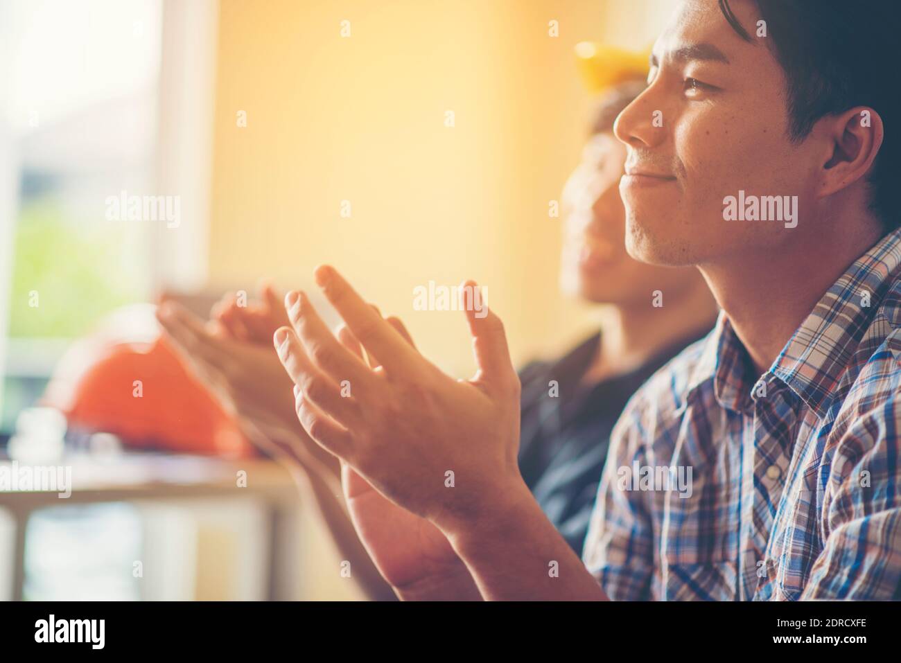 Two men clapping hi-res stock photography and images - Alamy