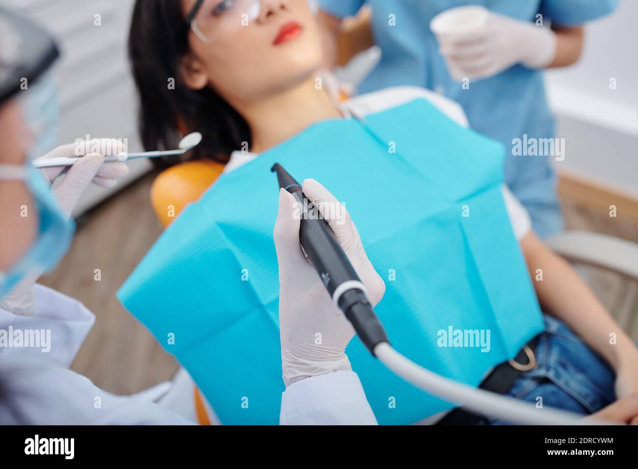 Dentist treating cavities Stock Photo - Alamy Dentist treating cavities Stock Photo - Alamy