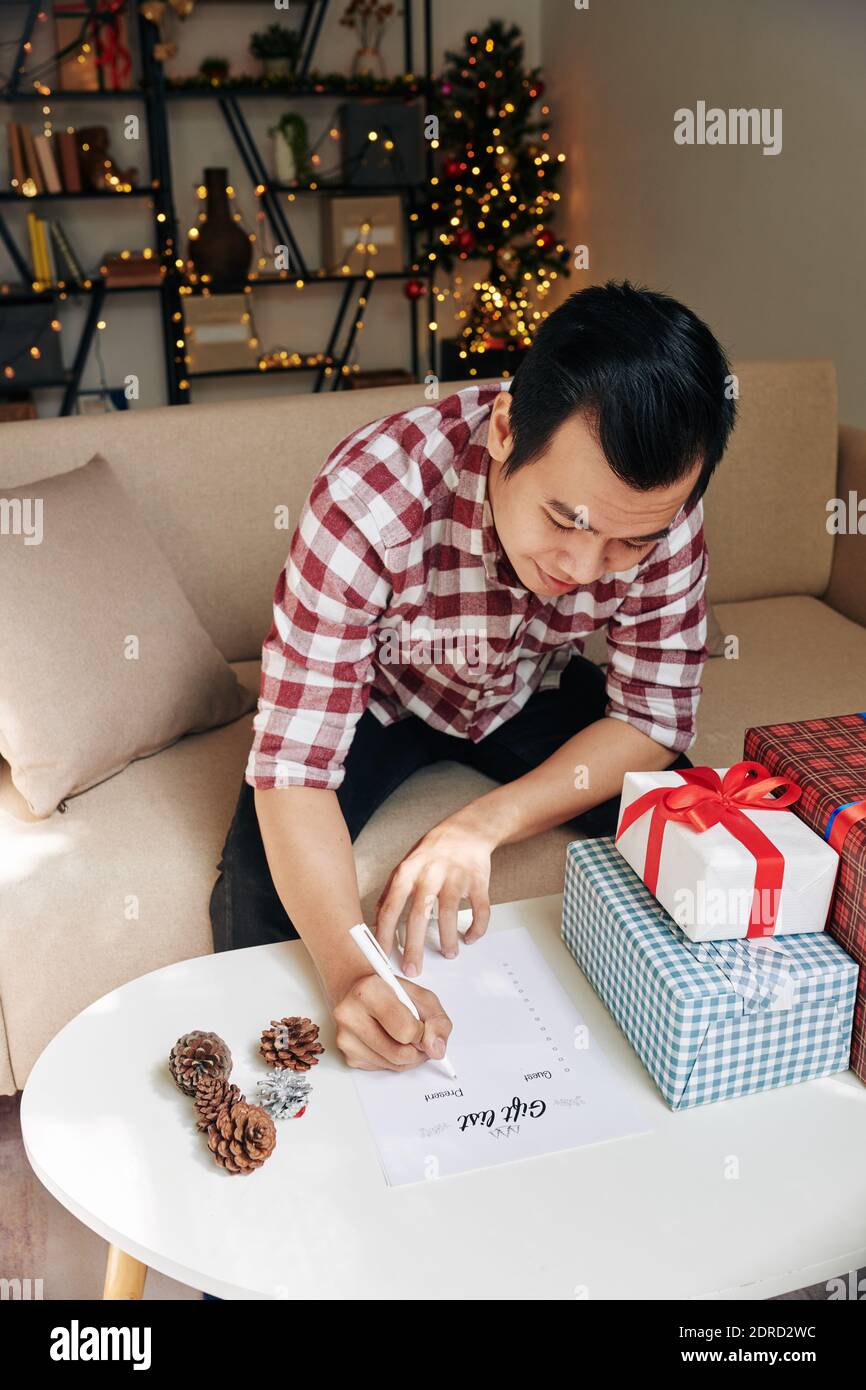 Young asian man filling hi-res stock photography and images - Alamy