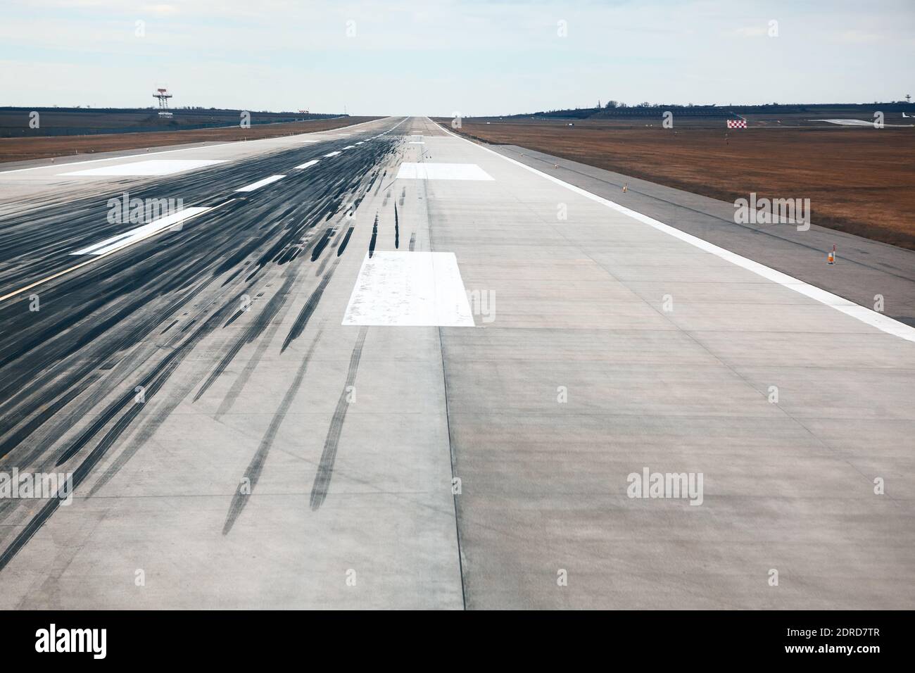 Airport runway with dirty rubber friction stain from landing Stock ...