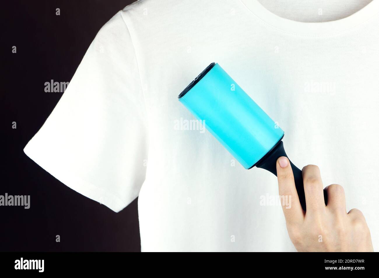 Clothing with static cling. roller for cleaning clothes Stock Photo - Alamy