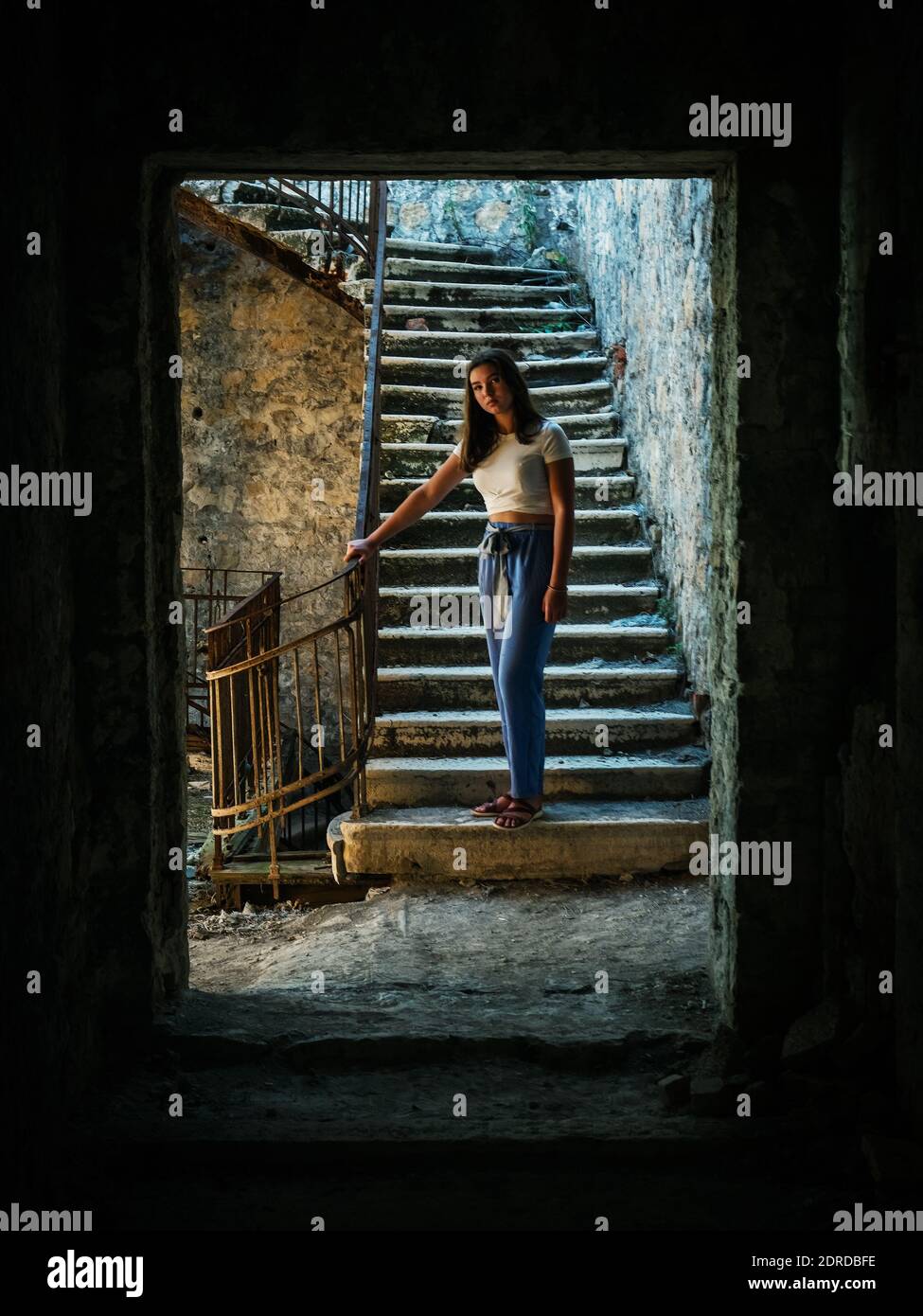 Girls standing in doorway on hi-res stock photography and images - Alamy