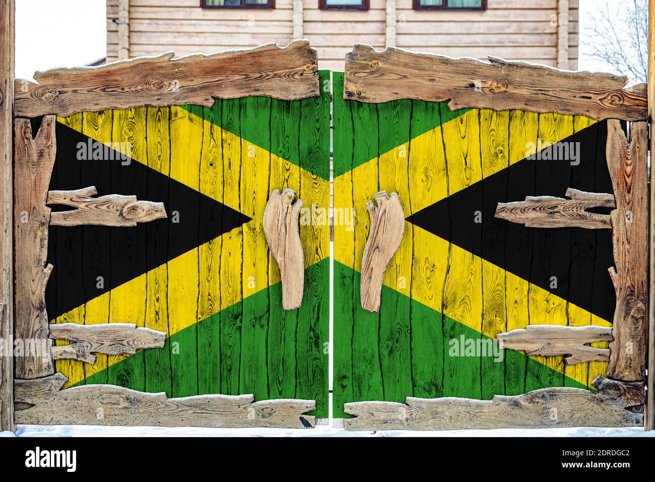 Close-up of the national flag of Jamaica on a wooden gate at the ...