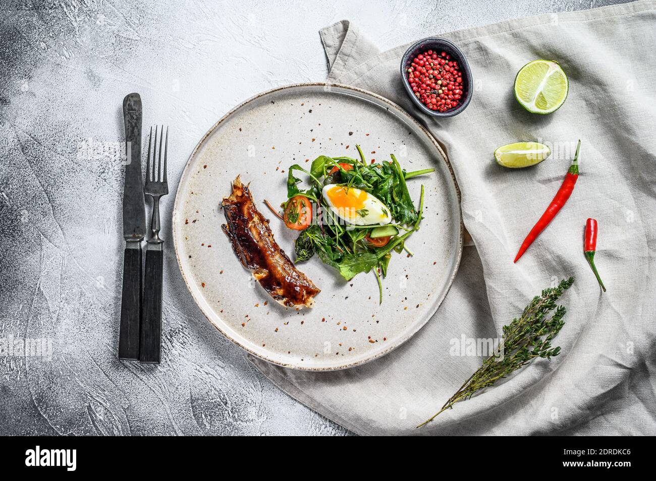 Grilled eel fillet in teriyaki sauce. Gray background. Top view Stock ...