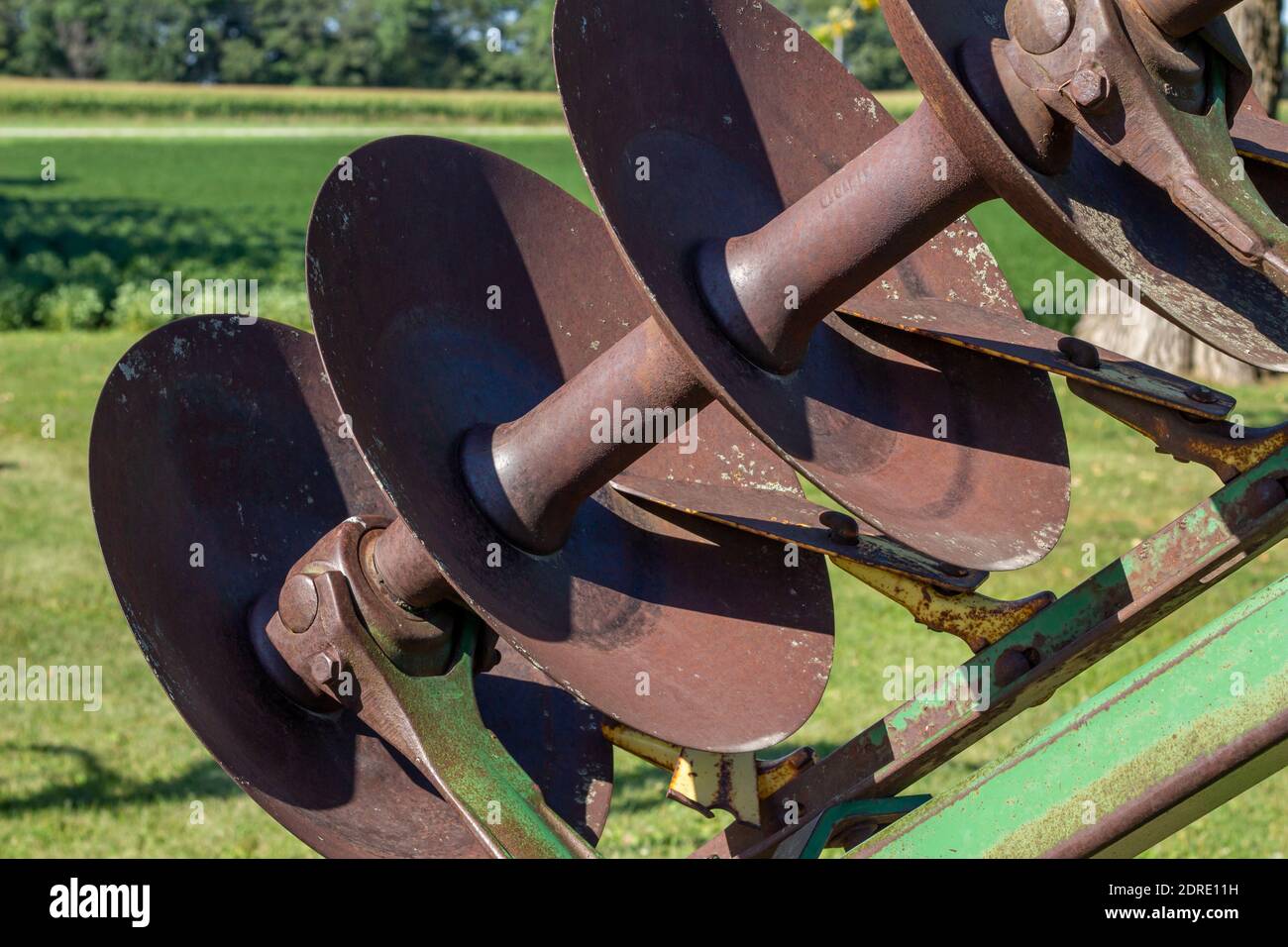 Close up abstract view of a vintage tractor drawn disc harrow ...