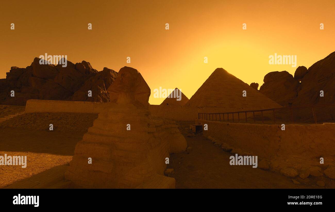 Fake sphinx and Egyptian pyramid in Bedouin village yellow sunset Stock ...