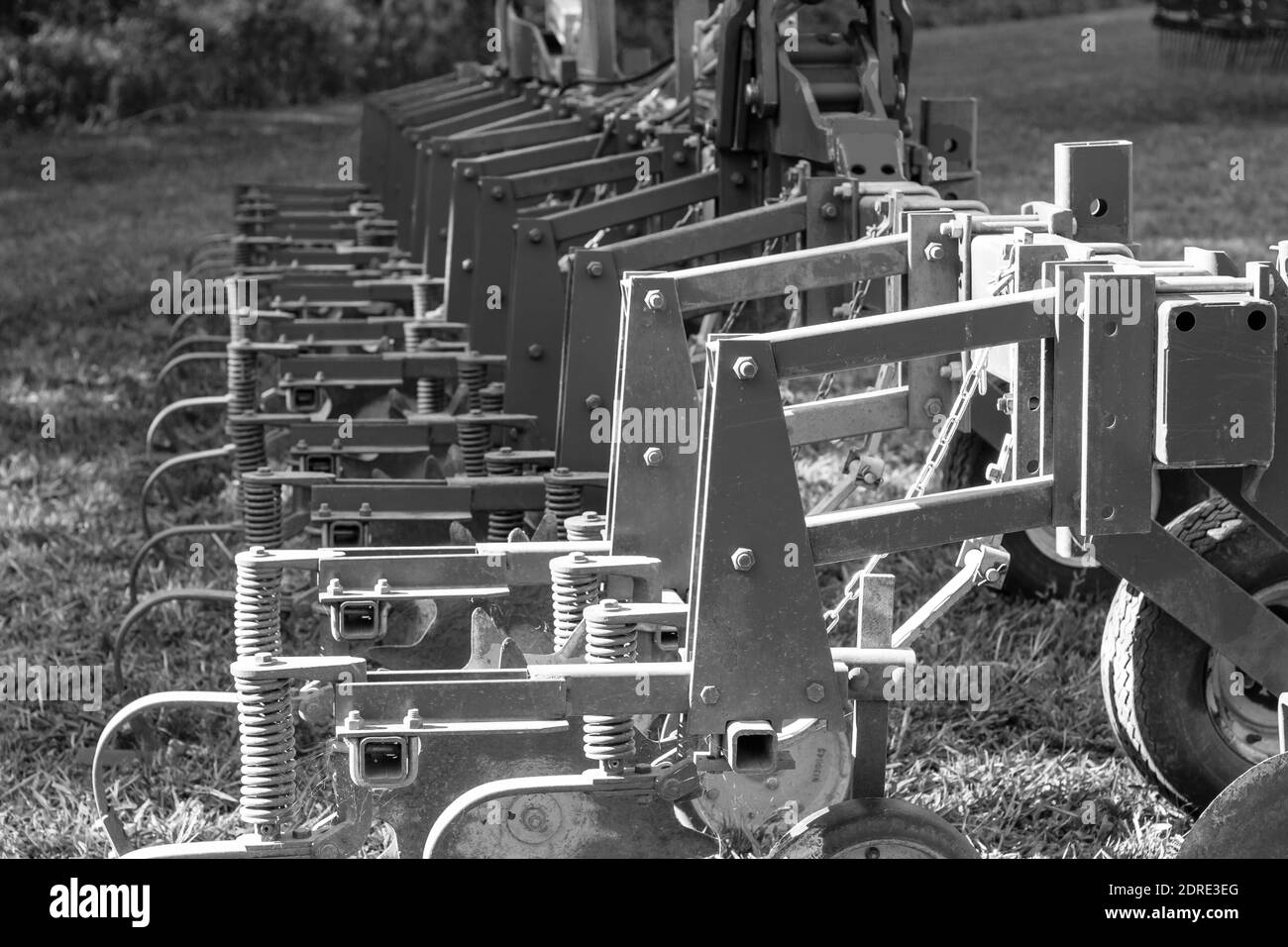 Close up abstract view of a vintage tractor drawn 12 row crop ...