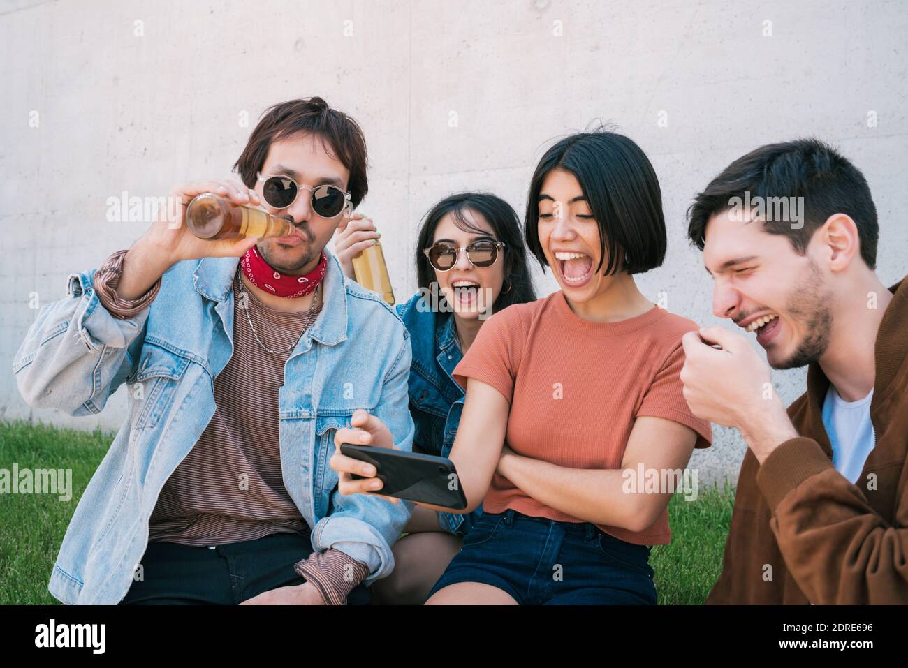 Watching something in phone hi-res stock photography and images - Alamy