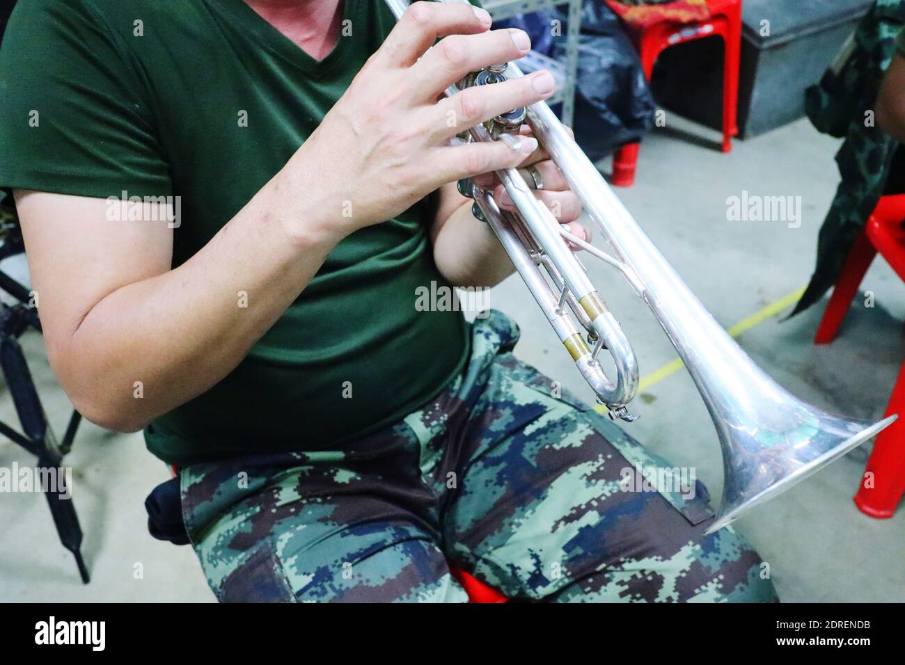 Playing trumpet one hand hi-res stock photography and images - Alamy