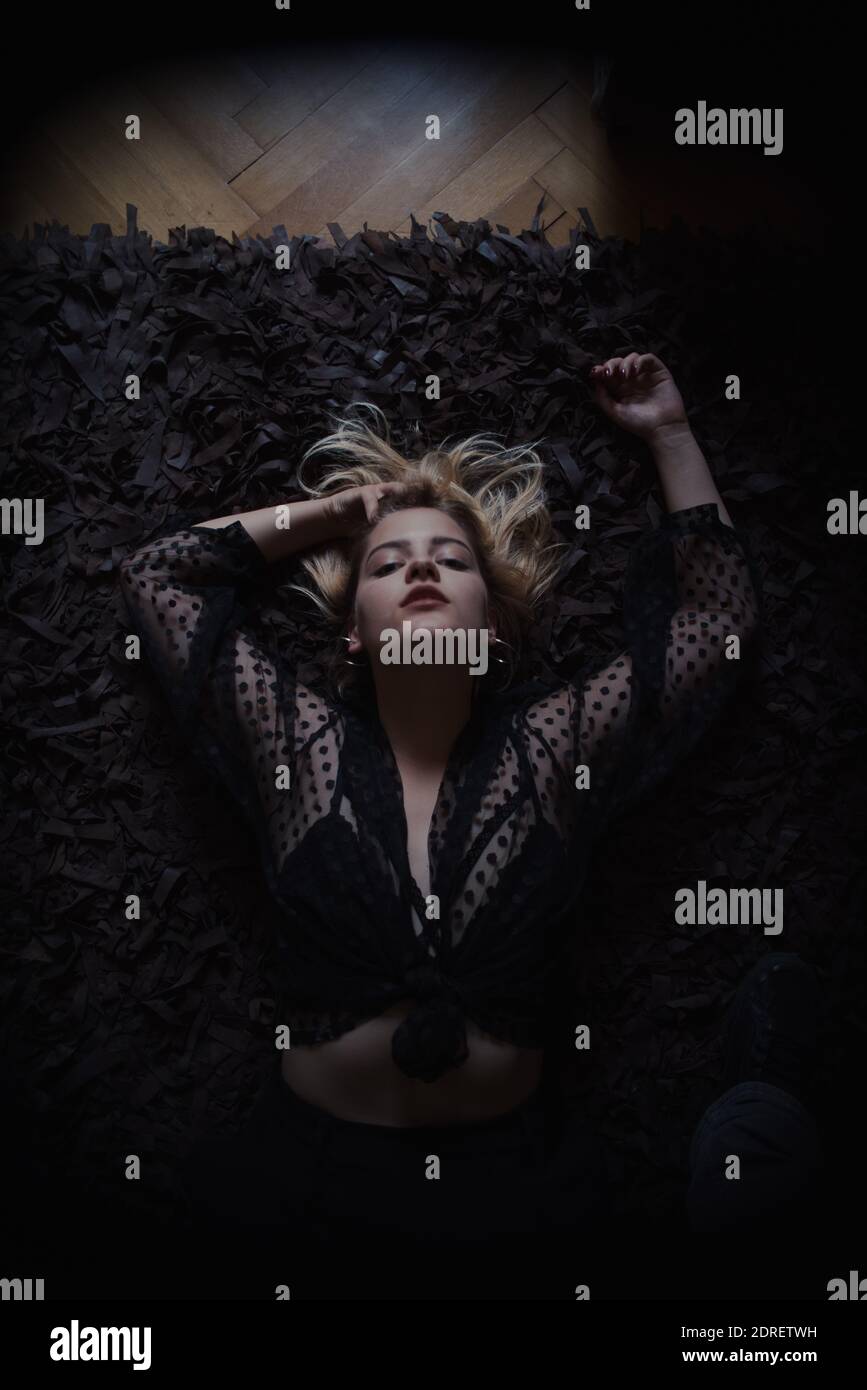 Woman lying on rug eyes closed hi-res stock photography and images - Alamy