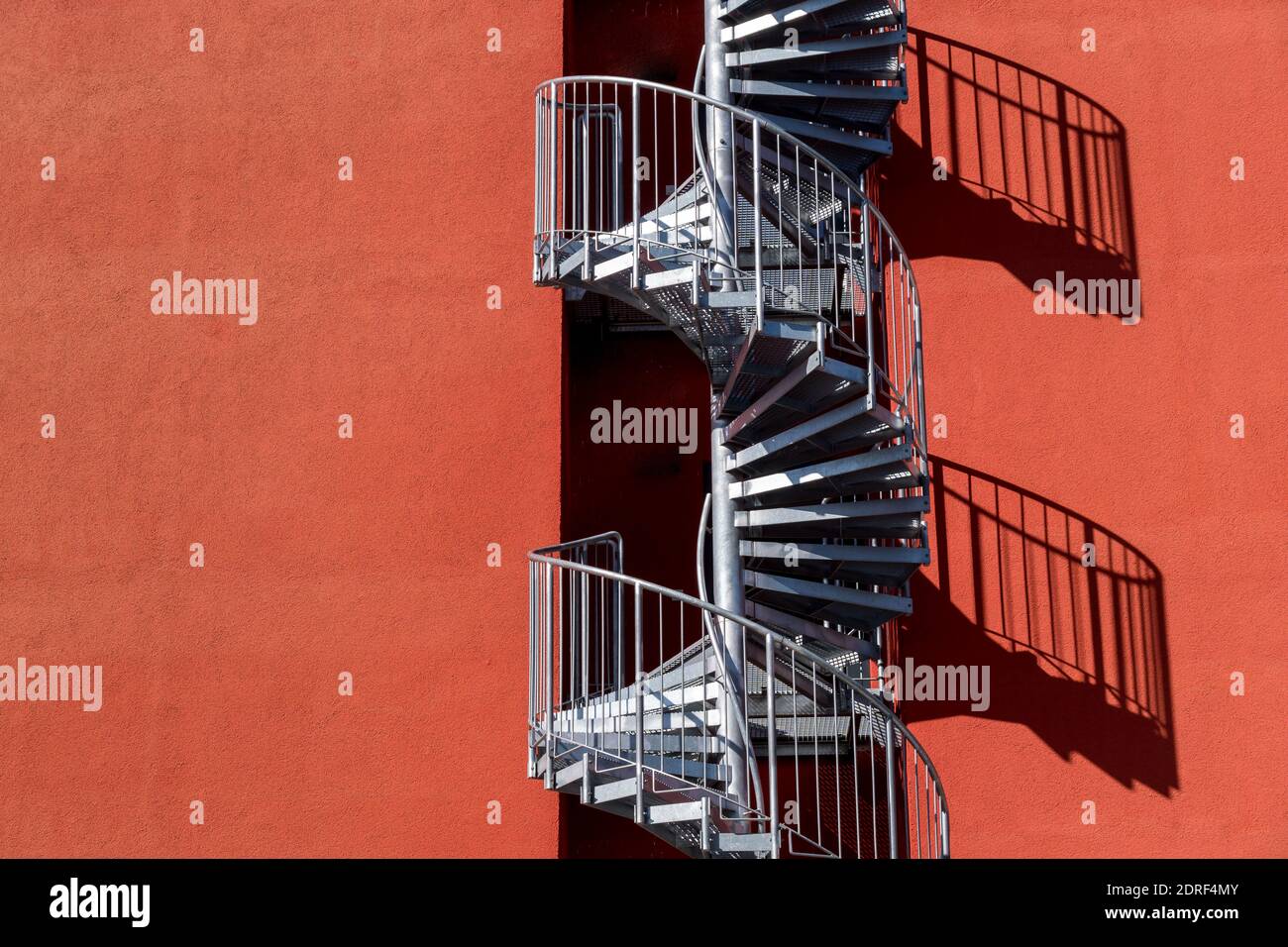 Spiral Staircase Against Wall Stock Photo - Alamy