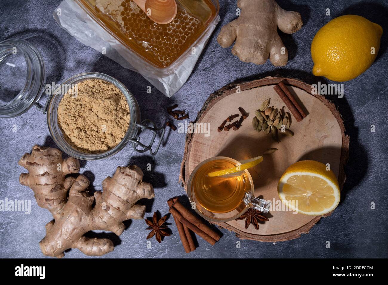 Ginger root and powder for cooking with spices Stock Photo - Alamy