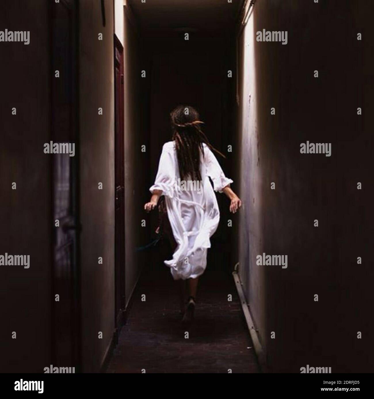 Woman running in corridor one person hi-res stock photography and ...