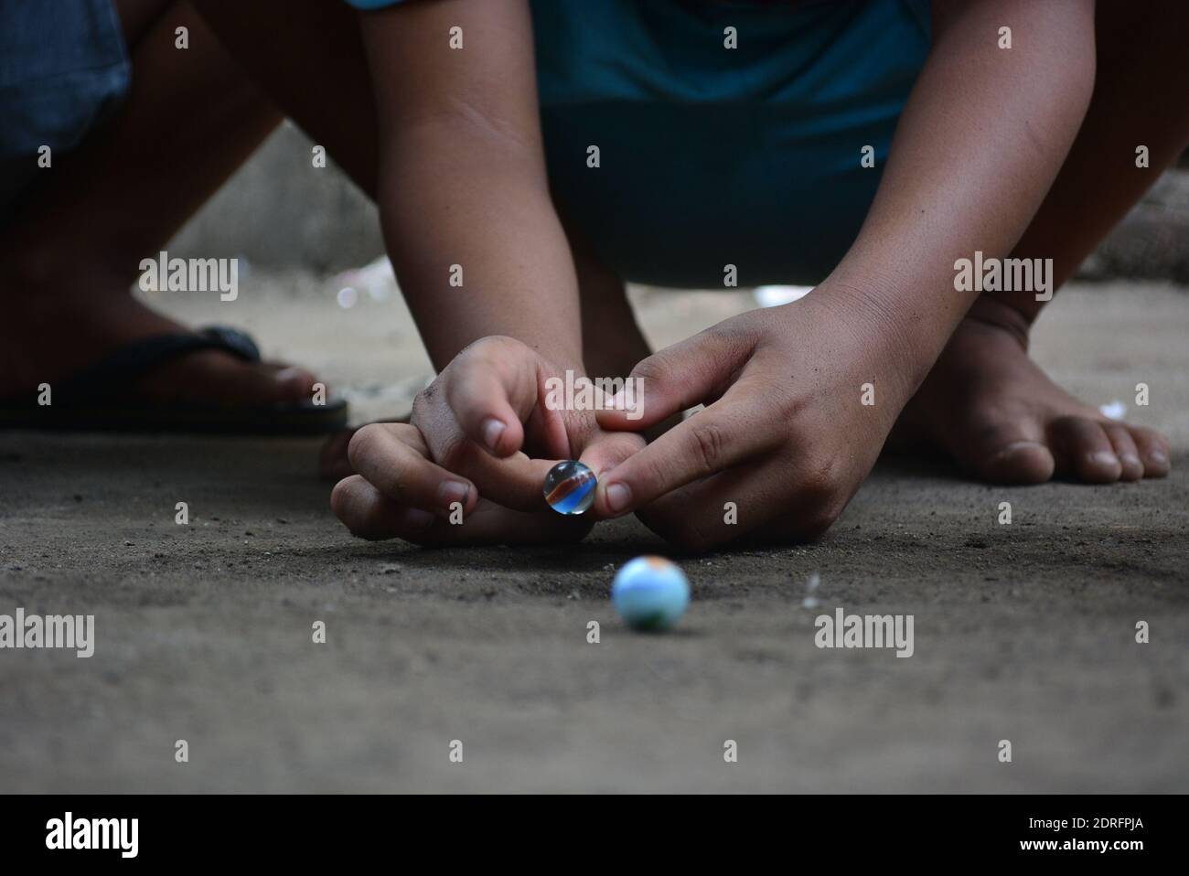 Hand Holding Marbles High Resolution Stock Photography and Images - Alamy