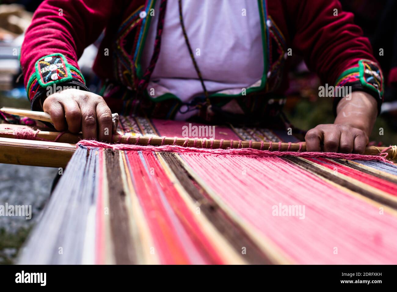 Traditional hand weaving in the Andes Mountains, Peru Stock Photo - Alamy