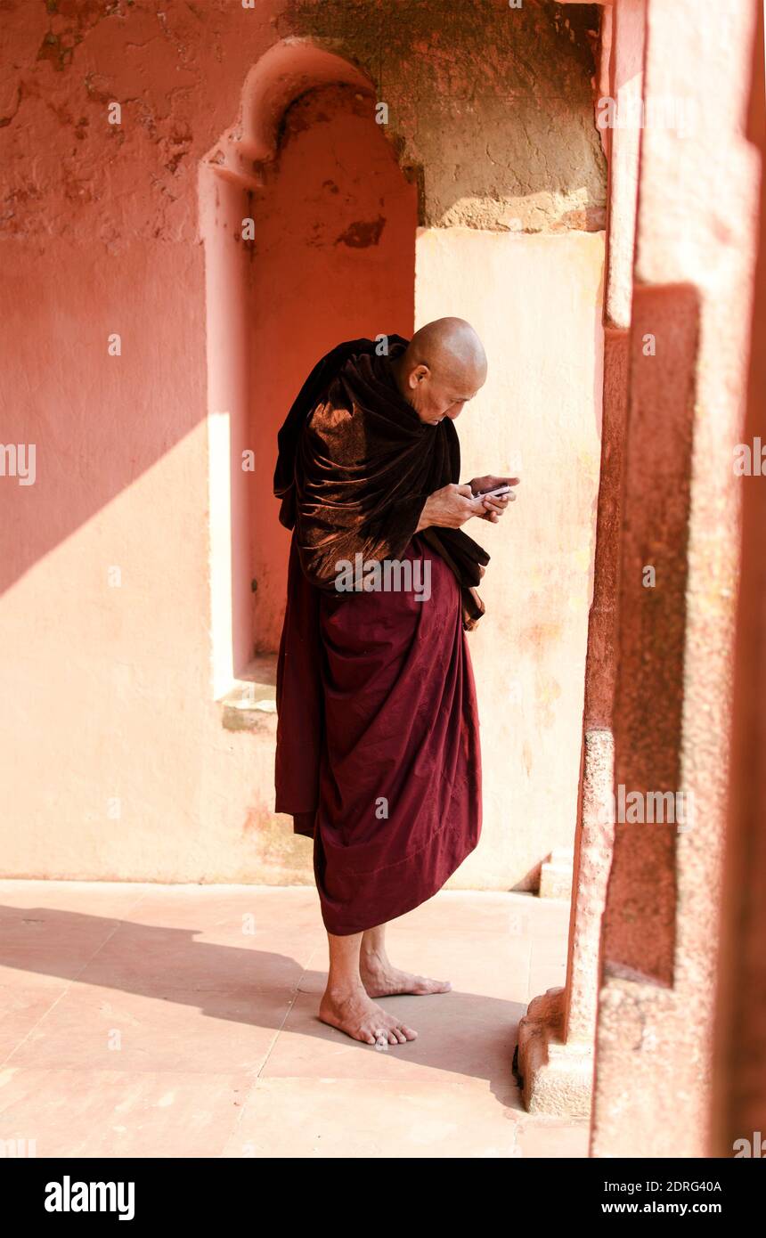 Mobile using monk hi-res stock photography and images - Alamy
