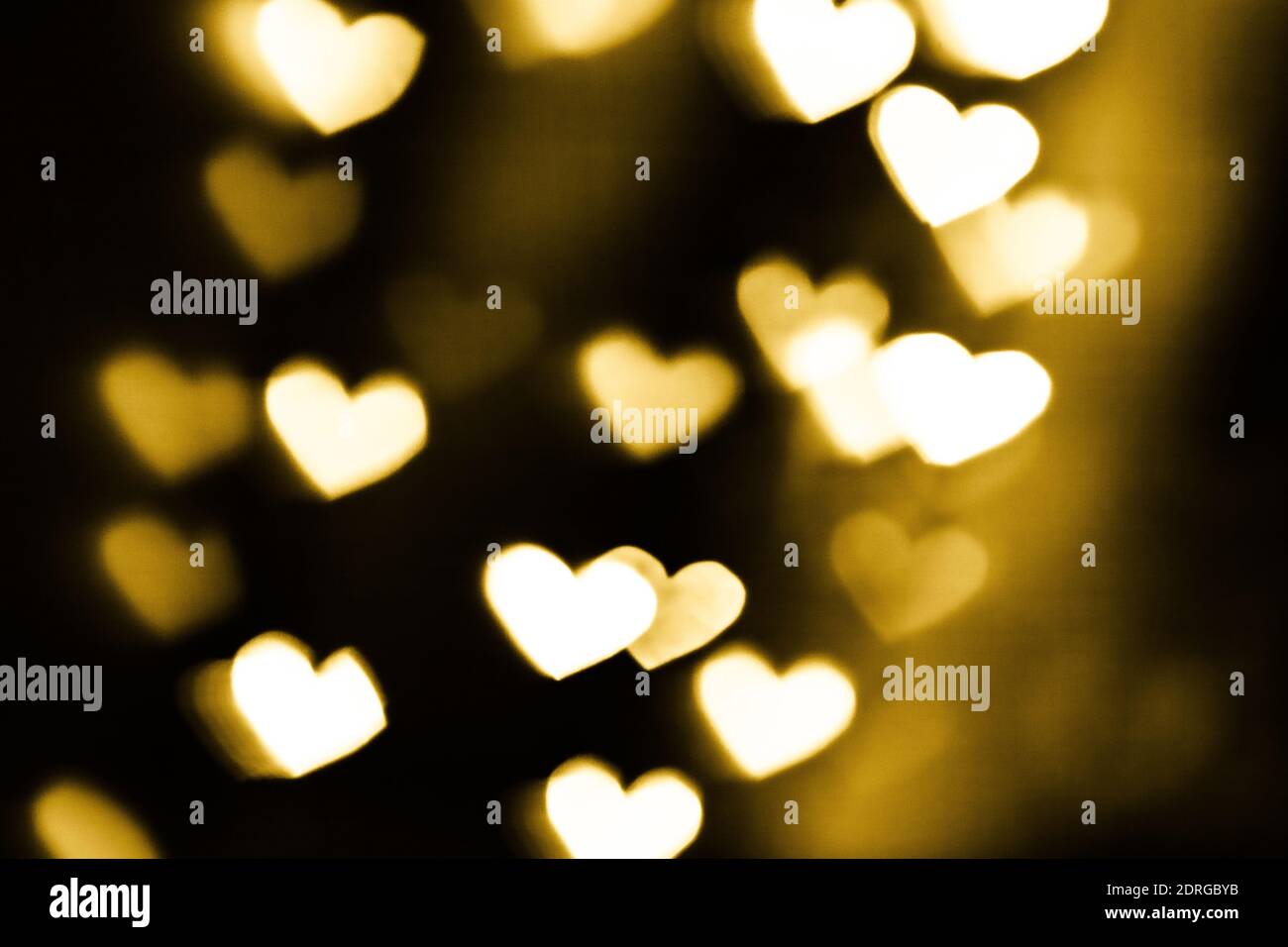 Gold heart background hi-res stock photography and images - Alamy