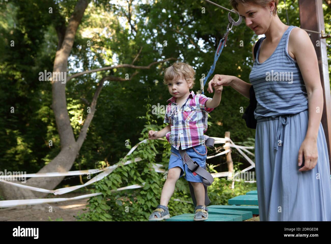 Mother son on obstacle hi-res stock photography and images - Alamy