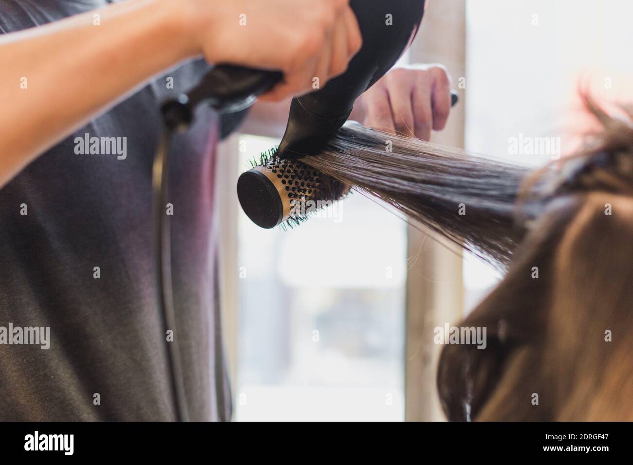 Blow drying hair brush hi-res stock photography and images - Alamy