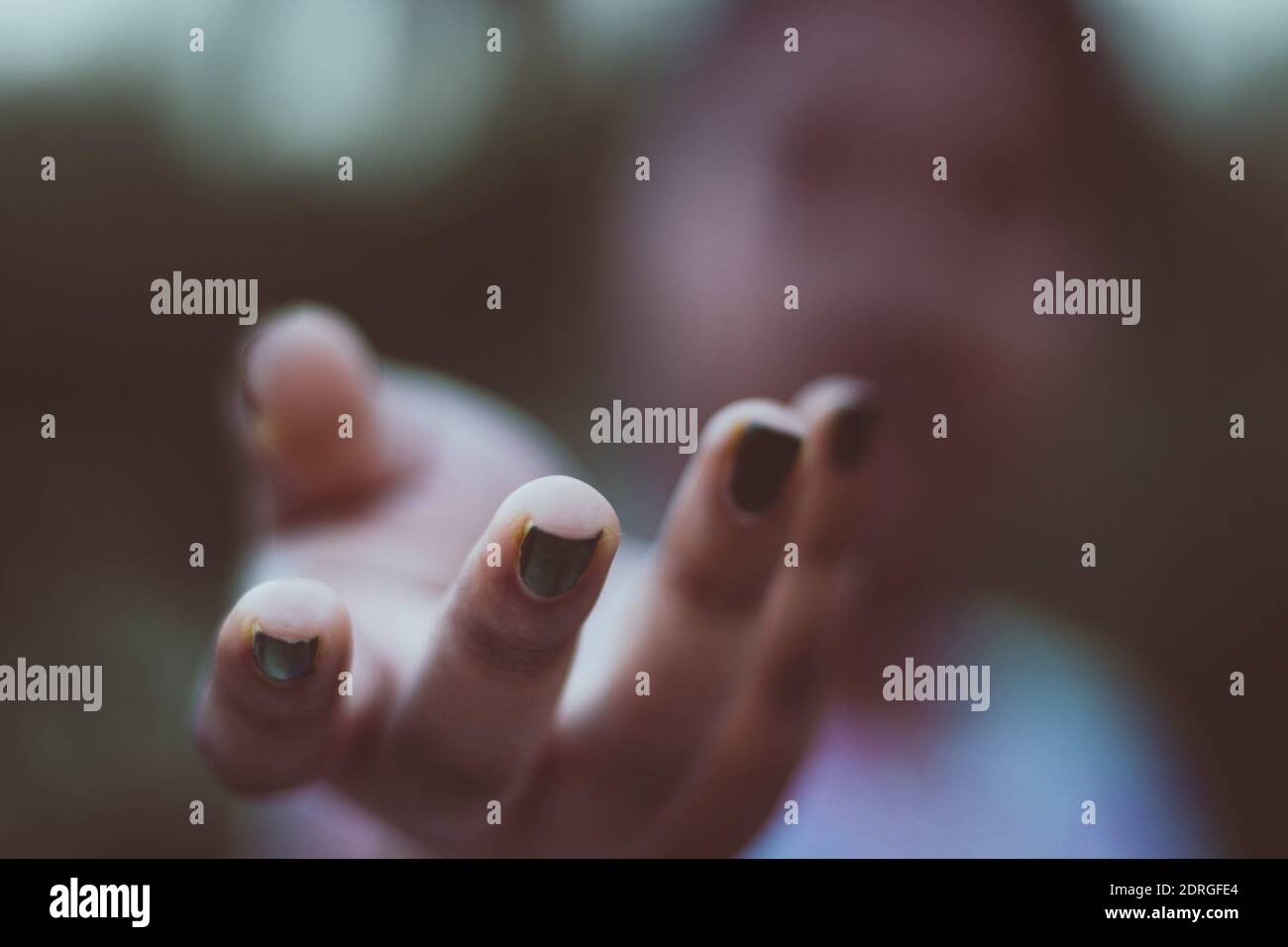 Painted nails face hi-res stock photography and images - Alamy