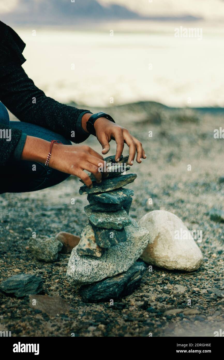 Men stacking stones hi-res stock photography and images - Alamy