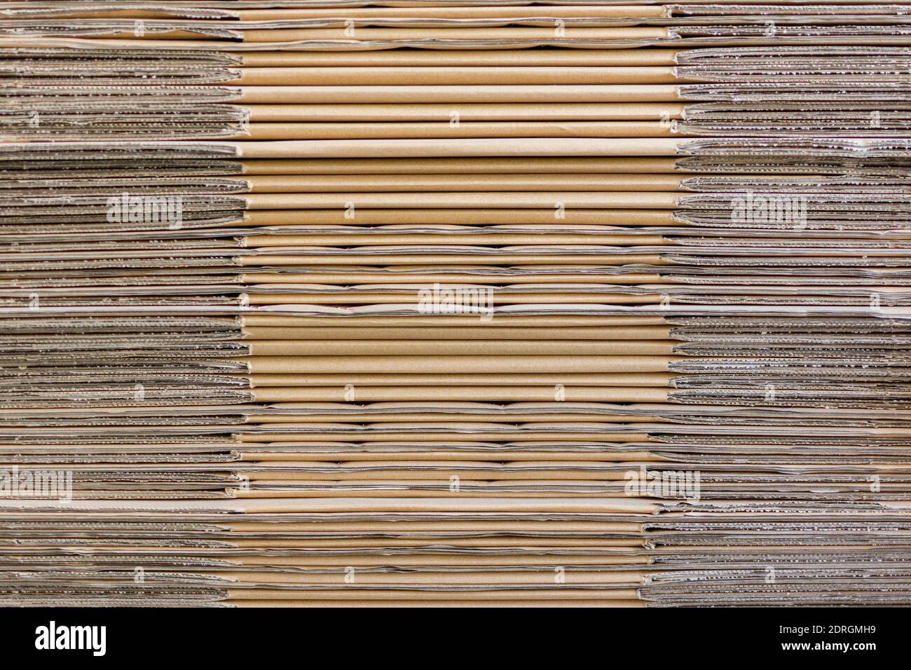 Pile of folded corrugated cardboard Stock Photo - Alamy