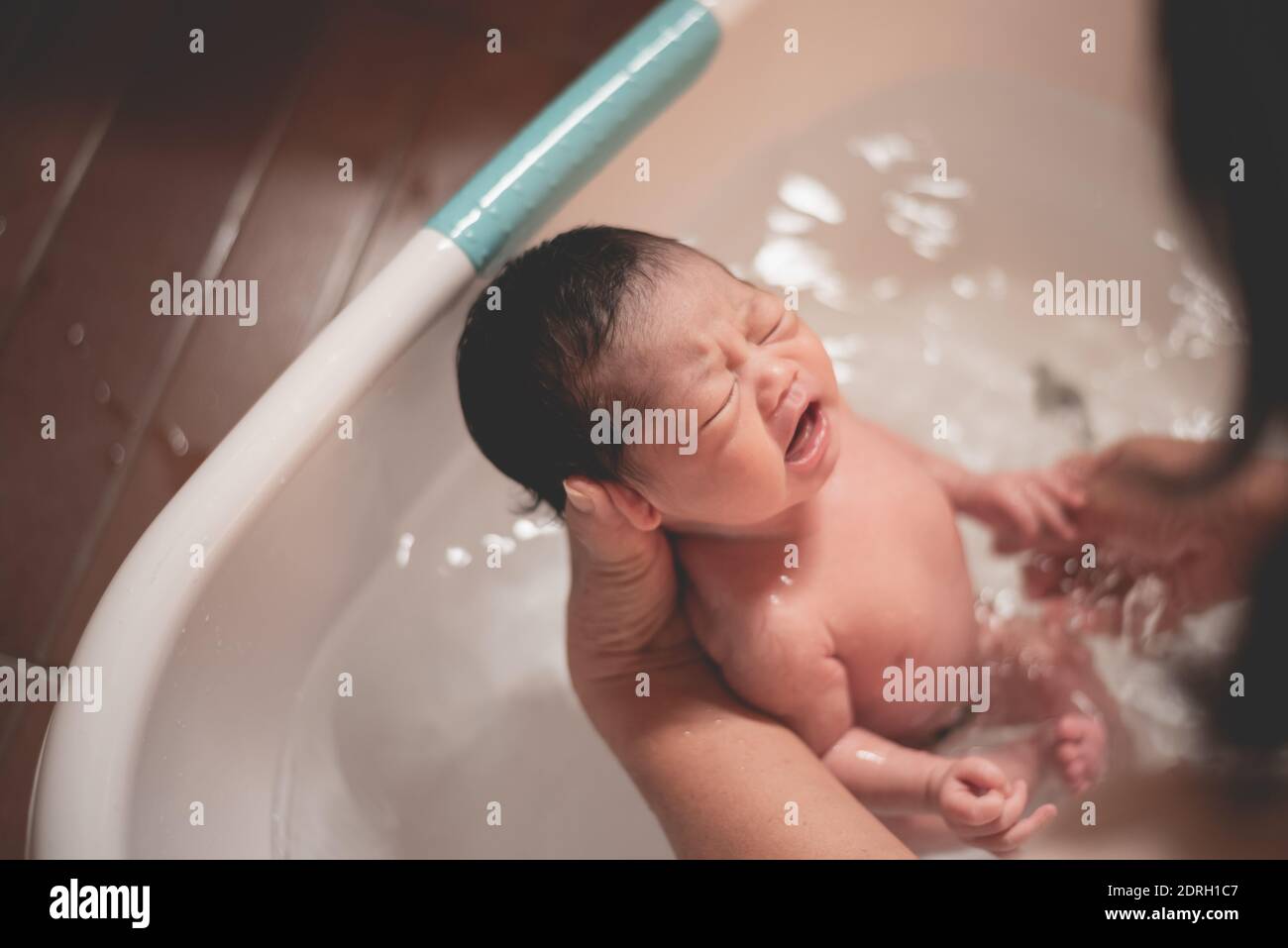 Mother taking bath with daughter hi-res stock photography and images ...