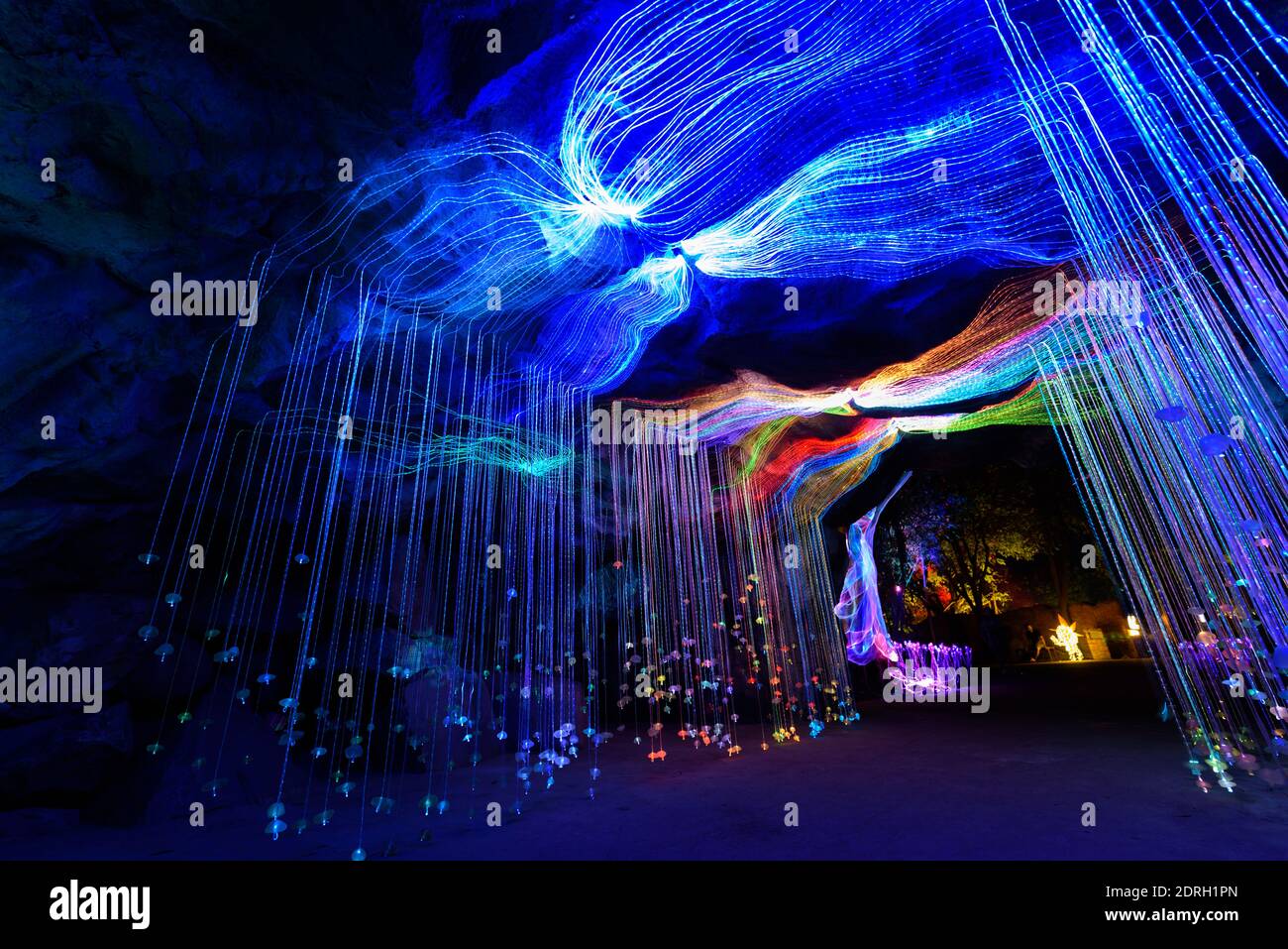 Lighting decorate on the cave like waterfall shape in lighting festival ...