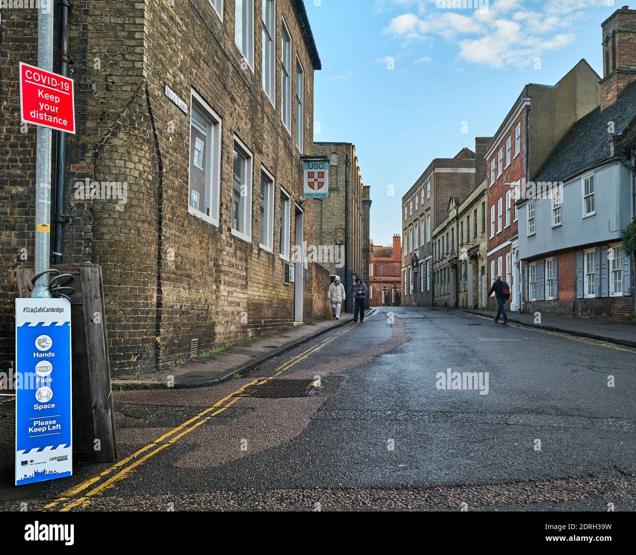 Stay safe notice (hands, face, space, and keep left) notice on a street ...