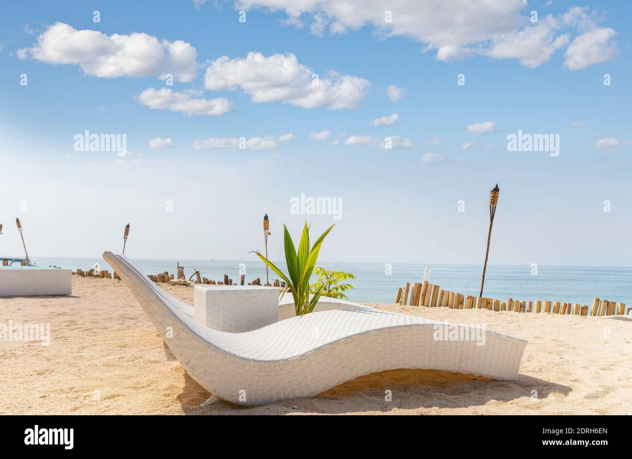 Luxury chairs on a sandy beach in ocean coast. Holiday and vacation ...