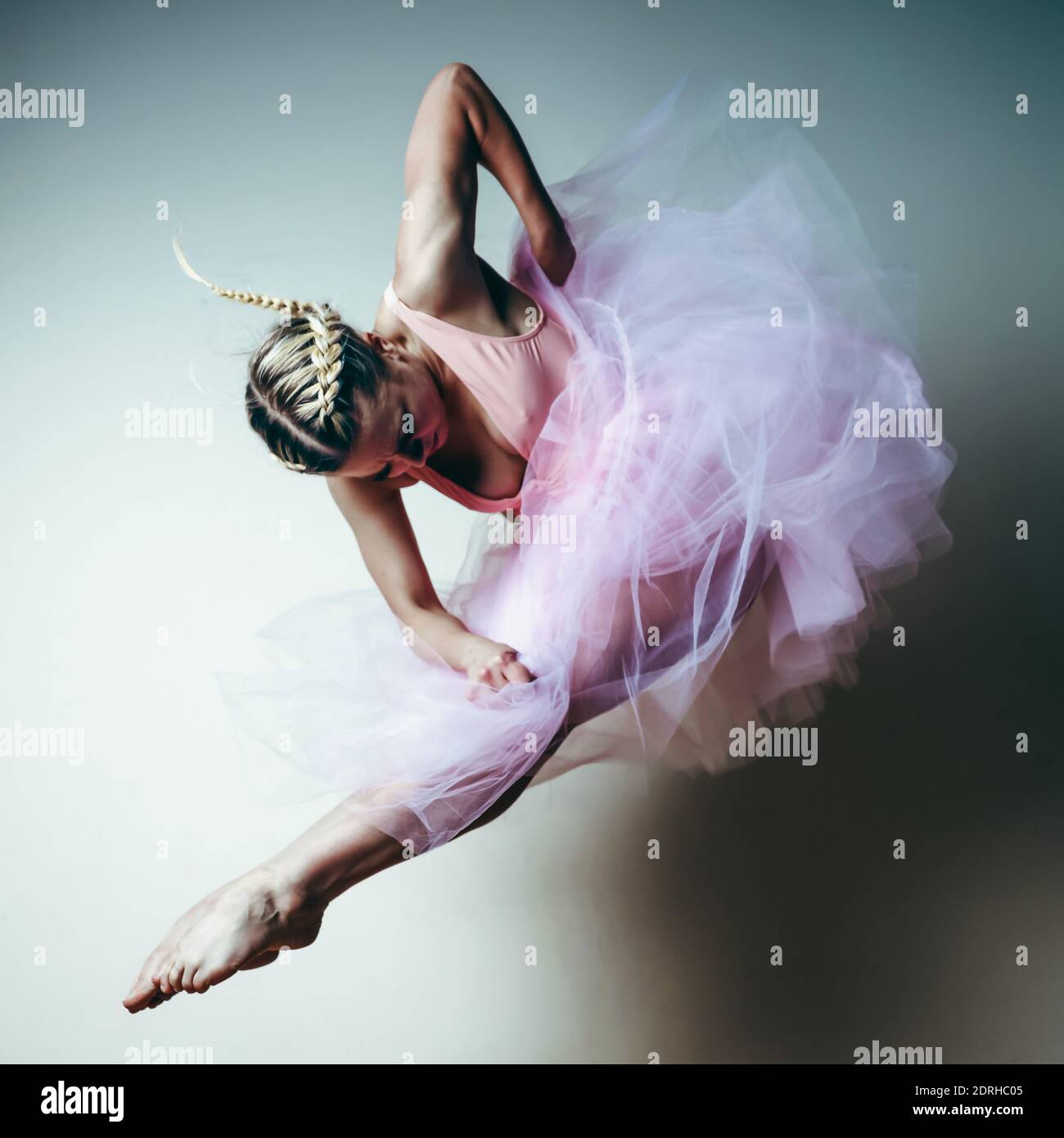 Women dancing jumping white dress hi-res stock photography and images ...